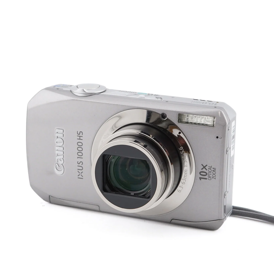 Descubre la versátil Canon IXUS 1000 HS en CameraShop 🔍 – Camera Market